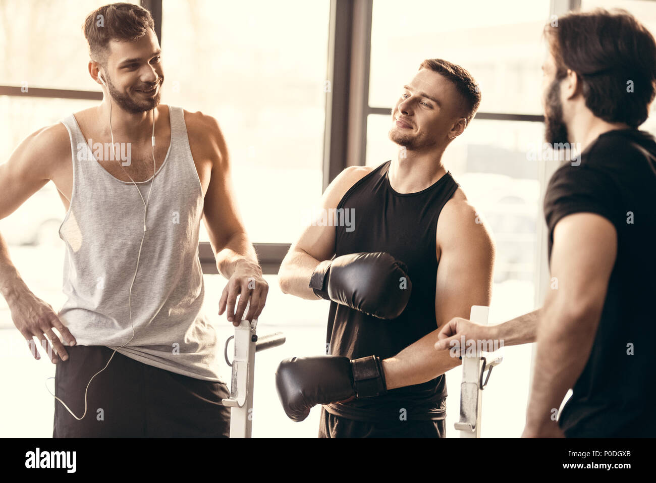 Three young sportsmen hi-res stock photography and images - Alamy