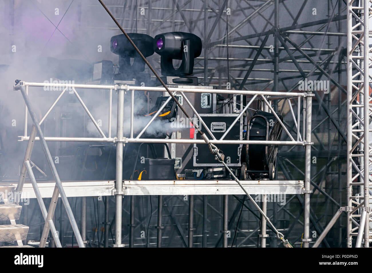 outdoor stage during concert with professional lightning equipment and ...