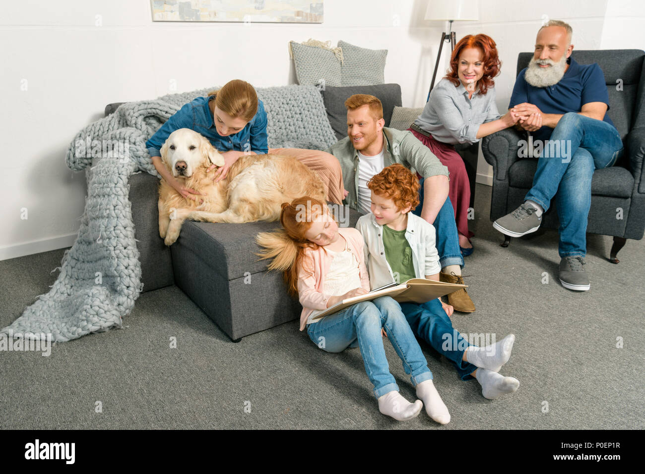 big family with dog spending time together at home Stock Photo - Alamy