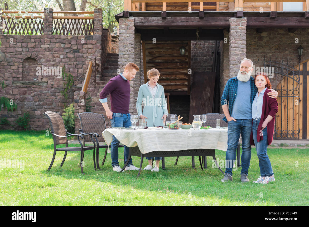 Young parents family at dinner table hi-res stock photography and ...