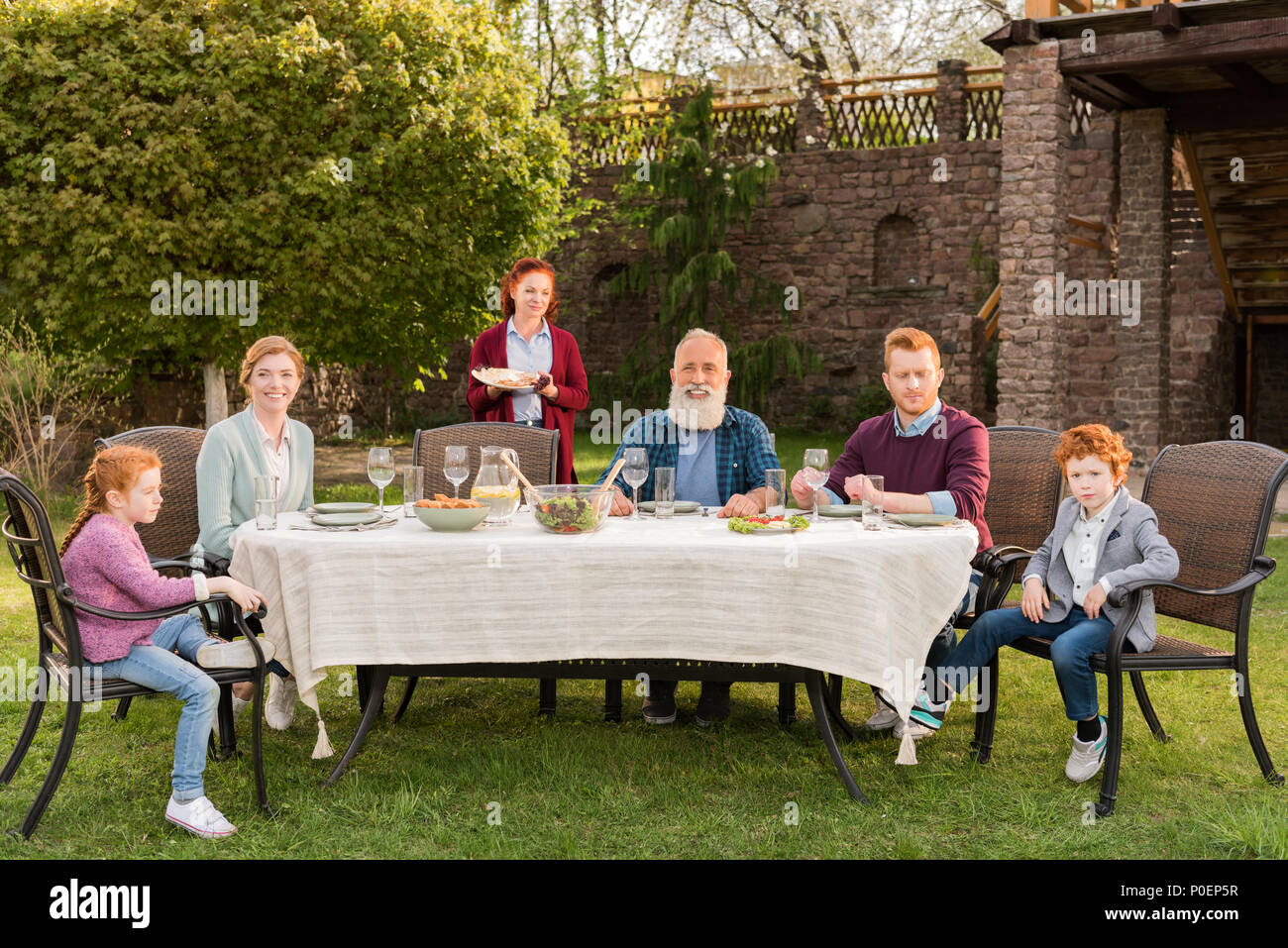 big happy family having dinner together at countryside Stock Photo - Alamy