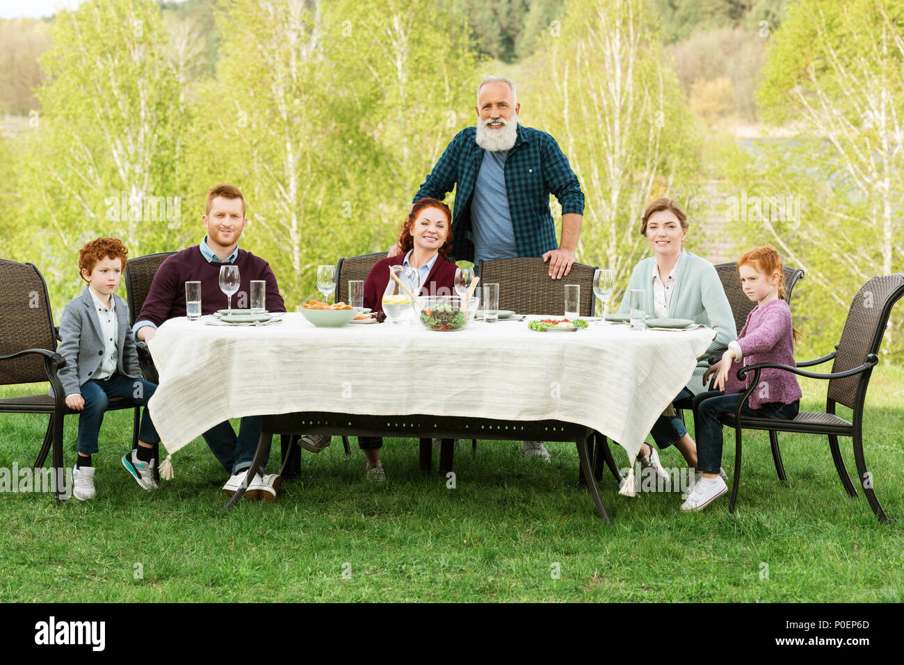 big happy family having dinner together at countryside Stock Photo - Alamy