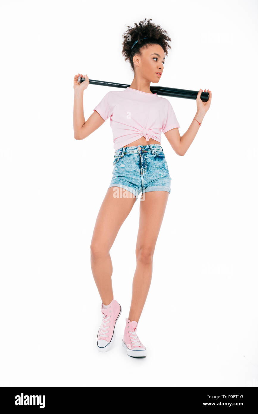 beautiful african american girl posing with baseball bat on shoulders ...