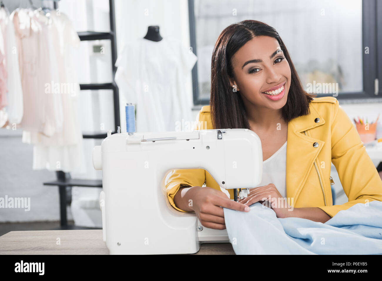 African dressmaker working sewing machine hi-res stock photography and ...