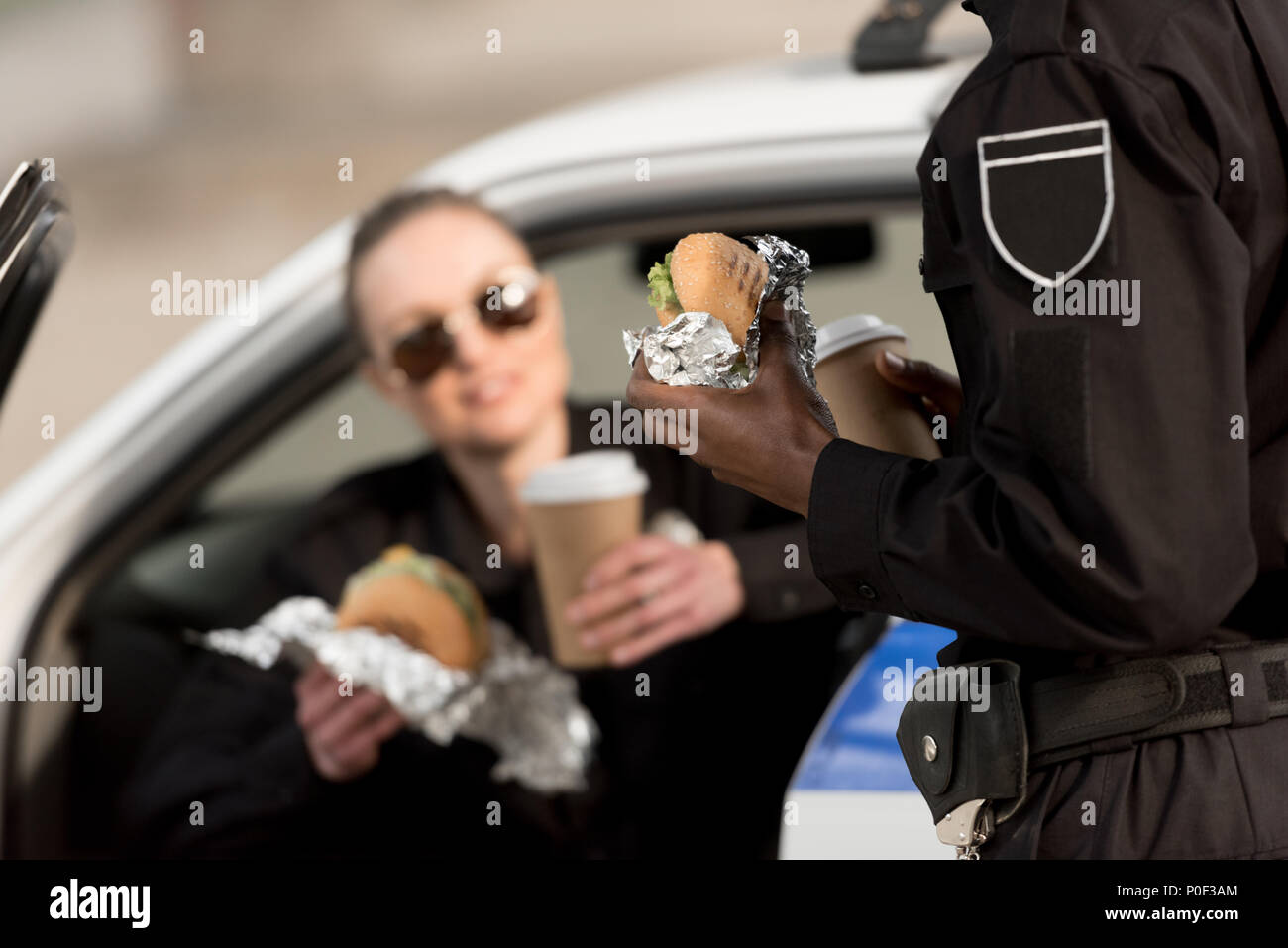 Police officers eat lunch hi-res stock photography and images - Alamy
