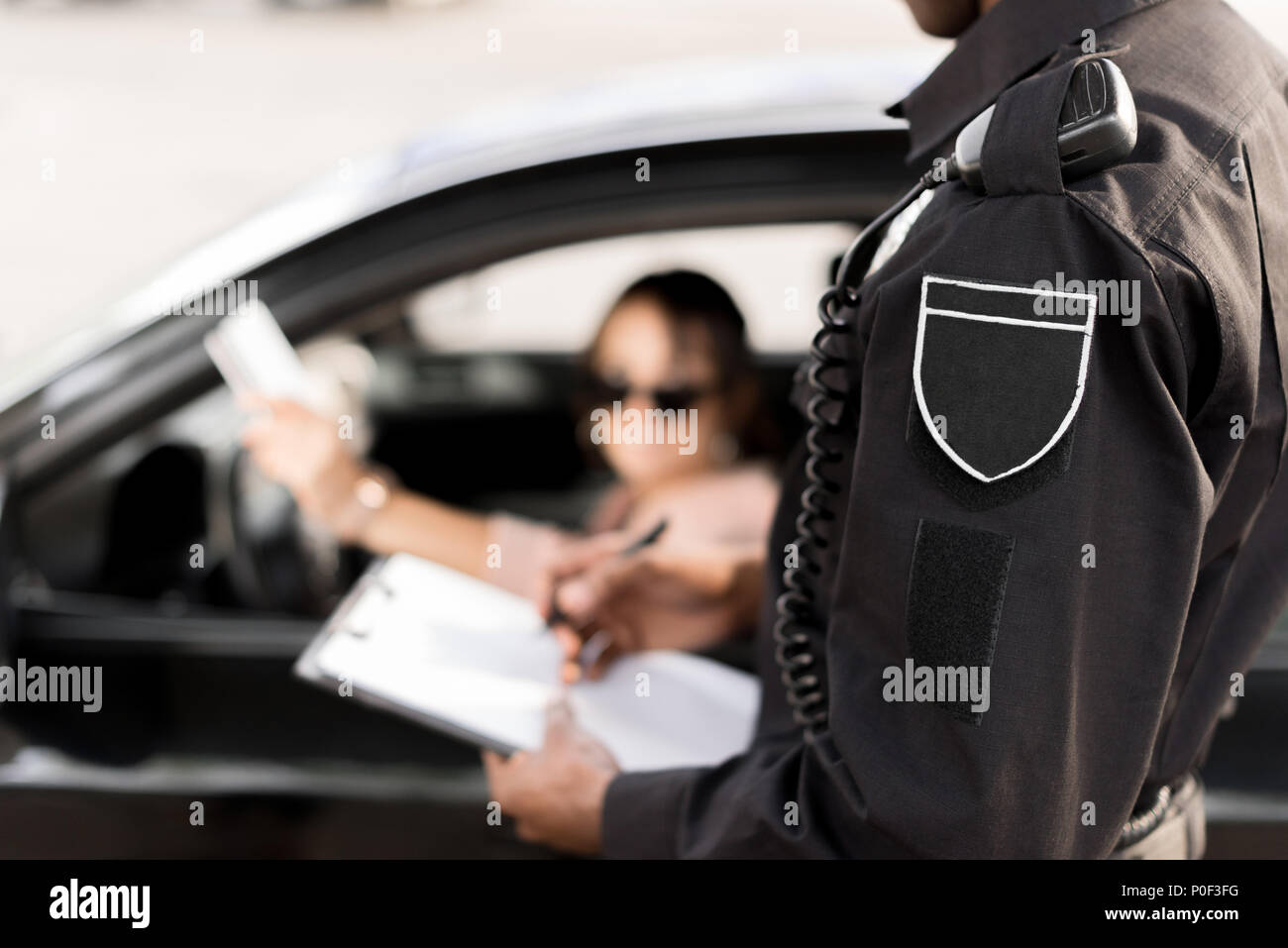 Policeman writing hi-res stock photography and images - Alamy