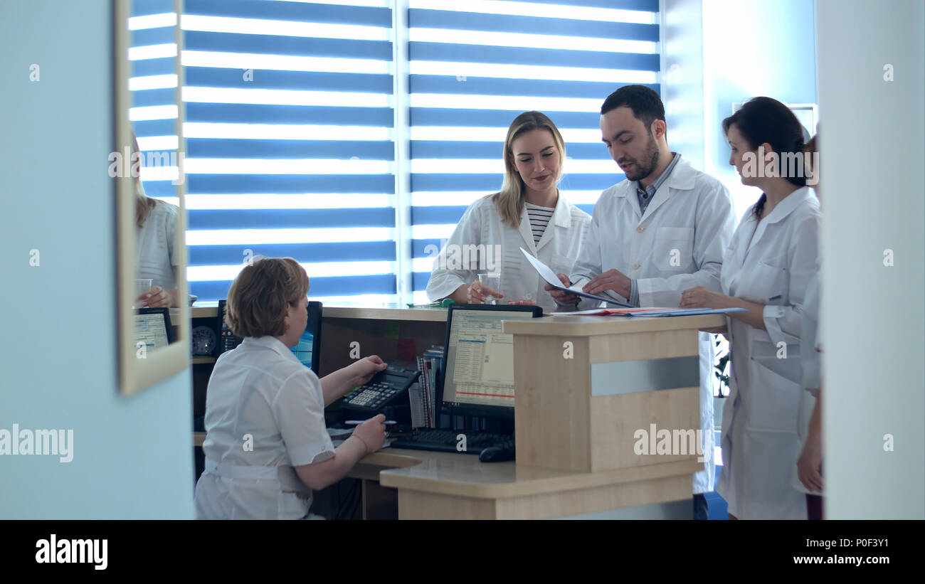 Female doctors reviewing patient data hi-res stock photography and ...