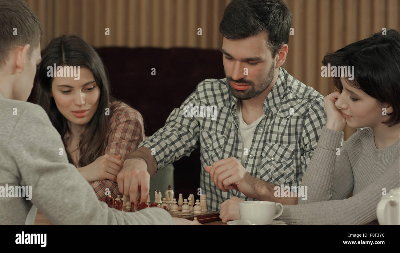 Black student playing chess hi-res stock photography and images - Alamy