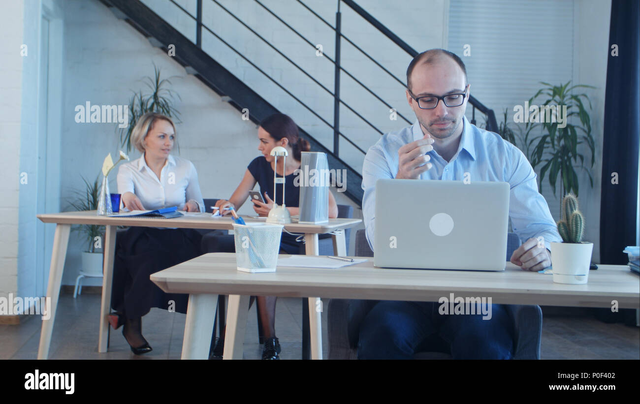 Team young professionals having relaxing in office Stock Photo - Alamy