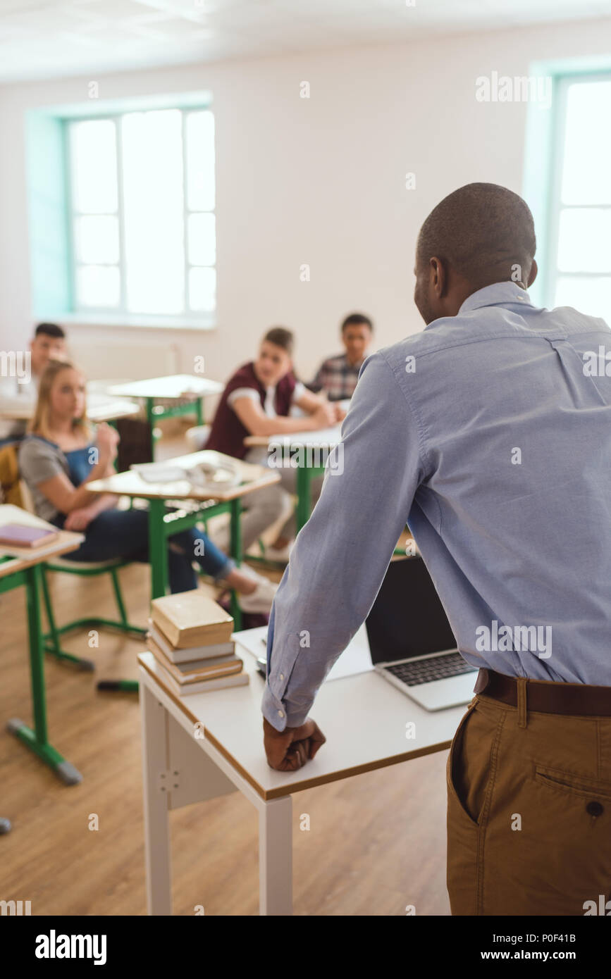 Children teacher school talking table hi-res stock photography and ...