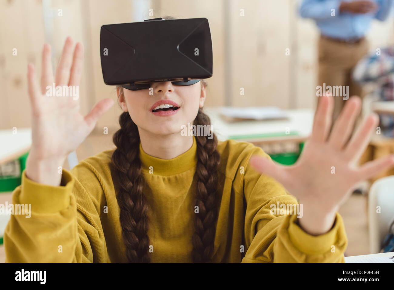 High school teenage student using virtual reality headset Stock Photo ...