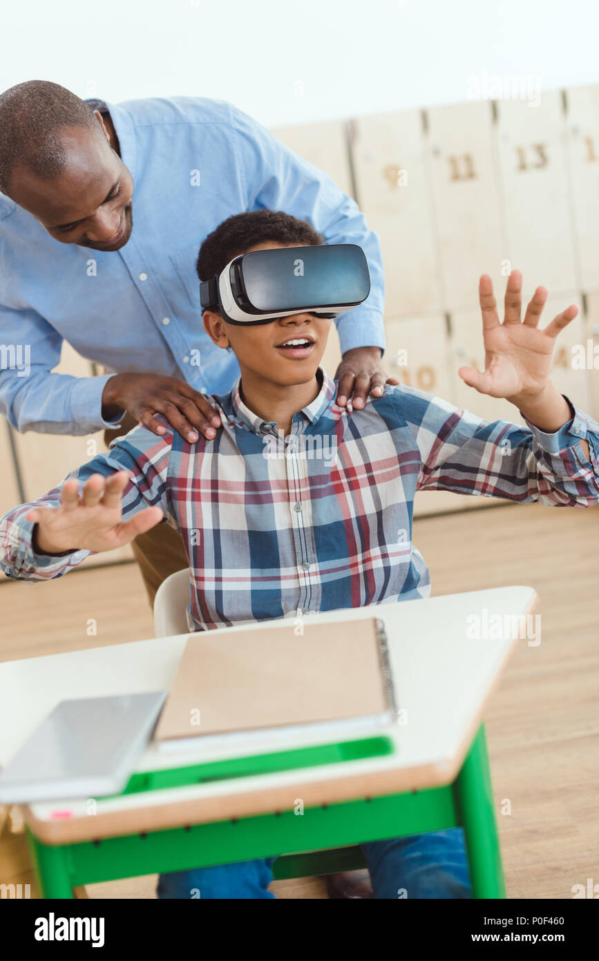 African male teacher classroom teen hi-res stock photography and images ...