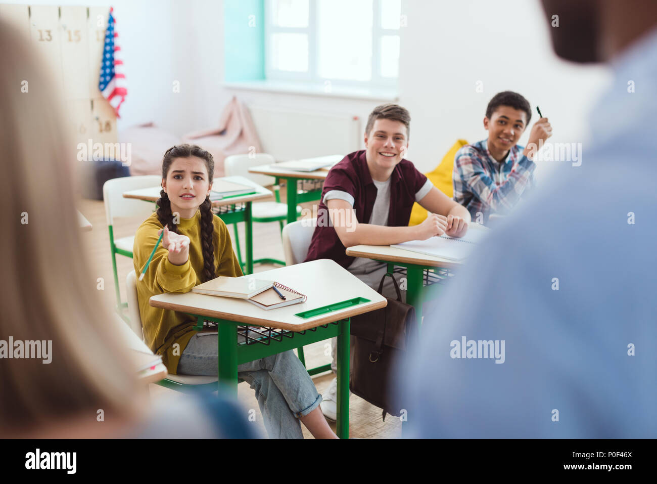 Teenage students classroom desks school hi-res stock photography and ...