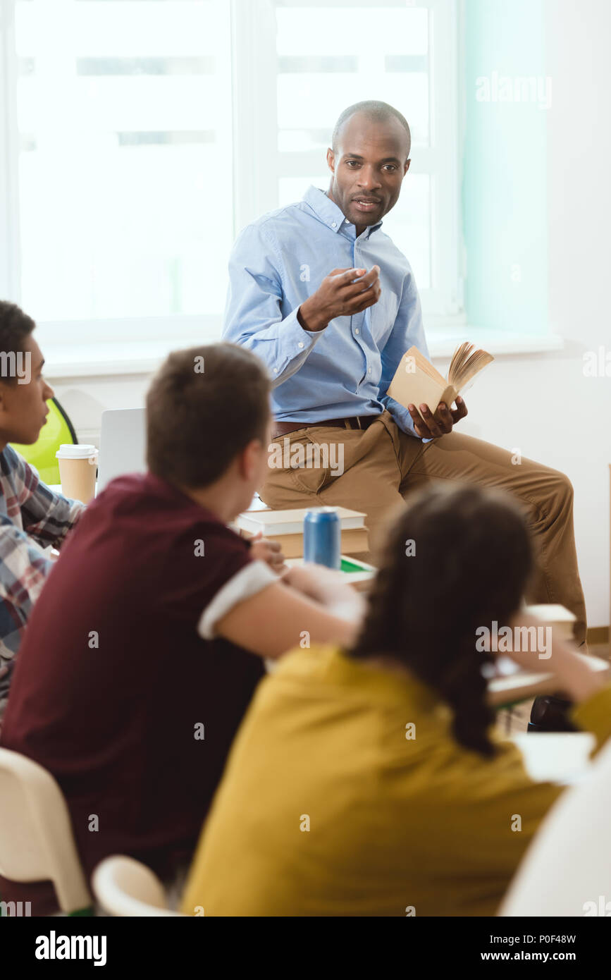 teacher performing lecture for high school students Stock Photo - Alamy