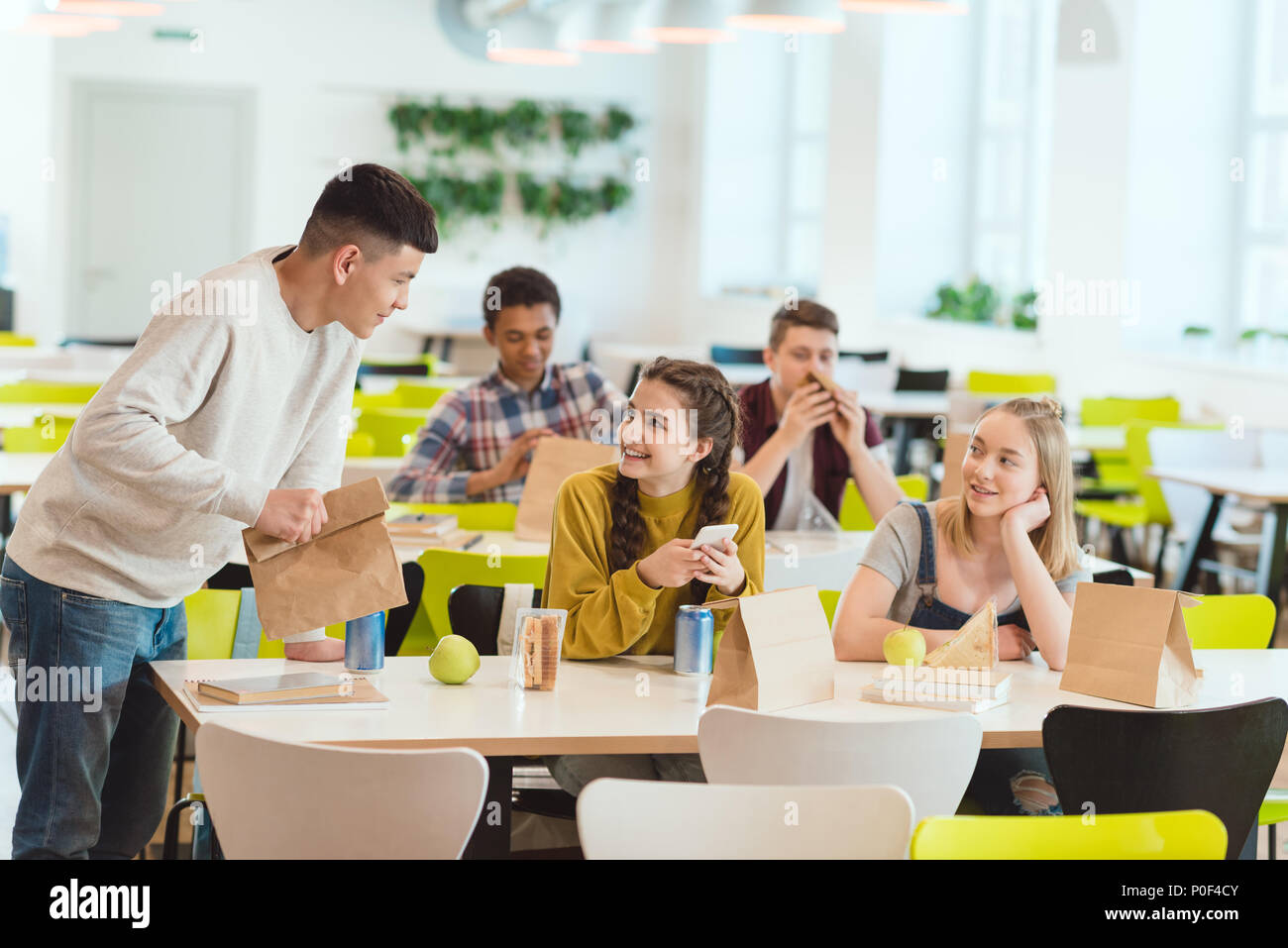 College cafeteria female students hi-res stock photography and images ...