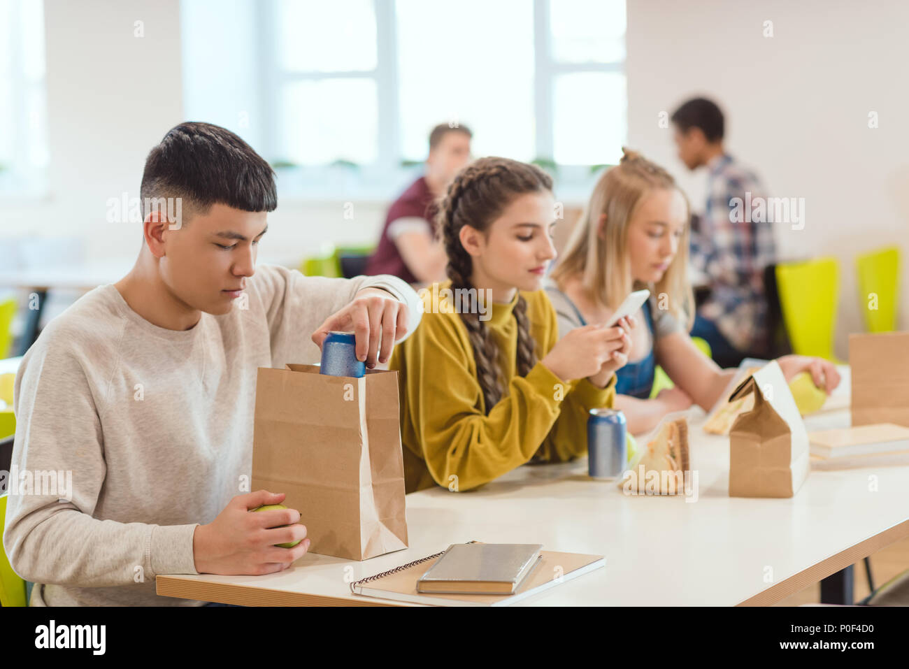 teenage high school students at school cafeteria during lunch Stock ...