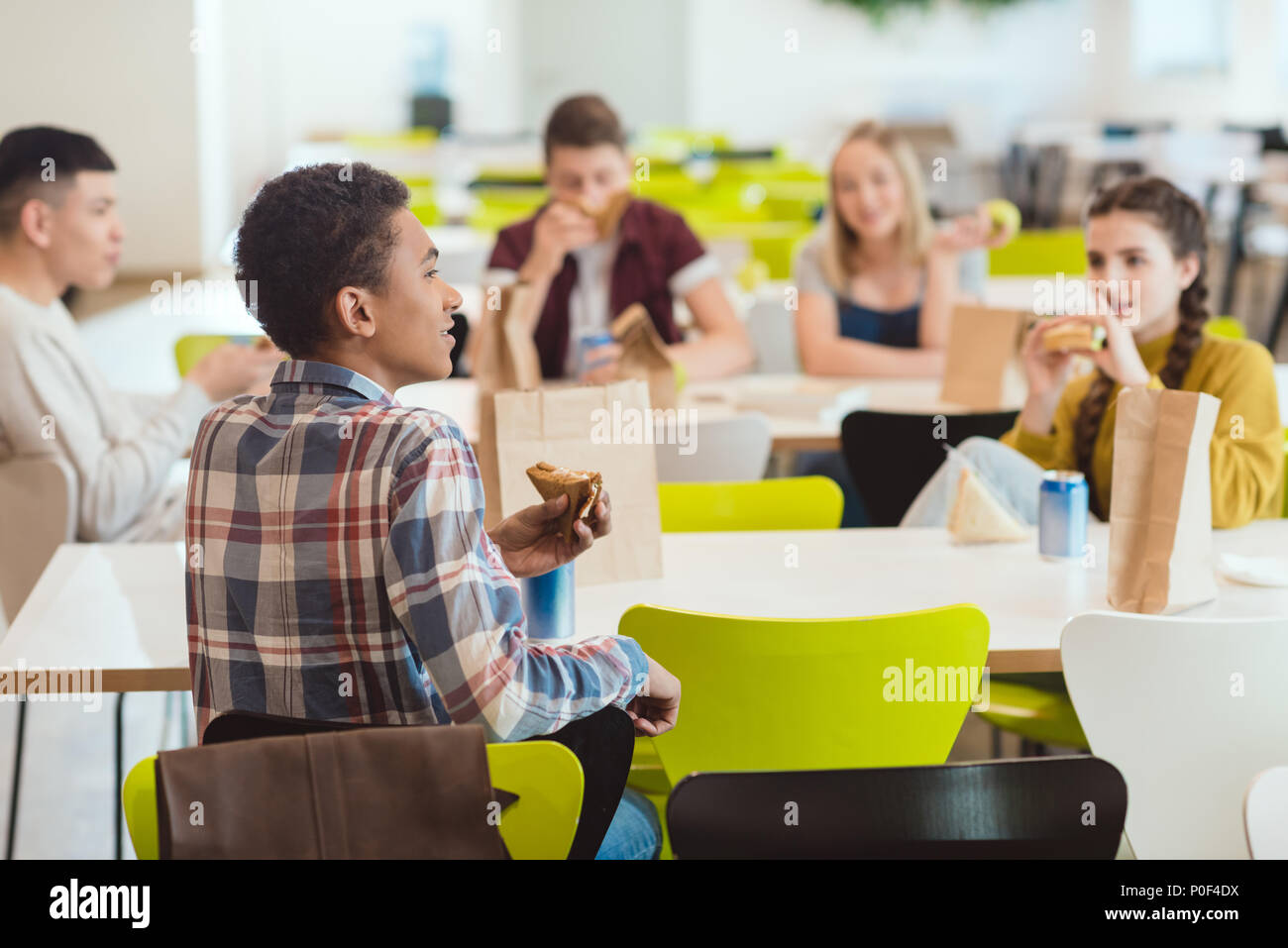 Multicultural students lunch school hi-res stock photography and images ...