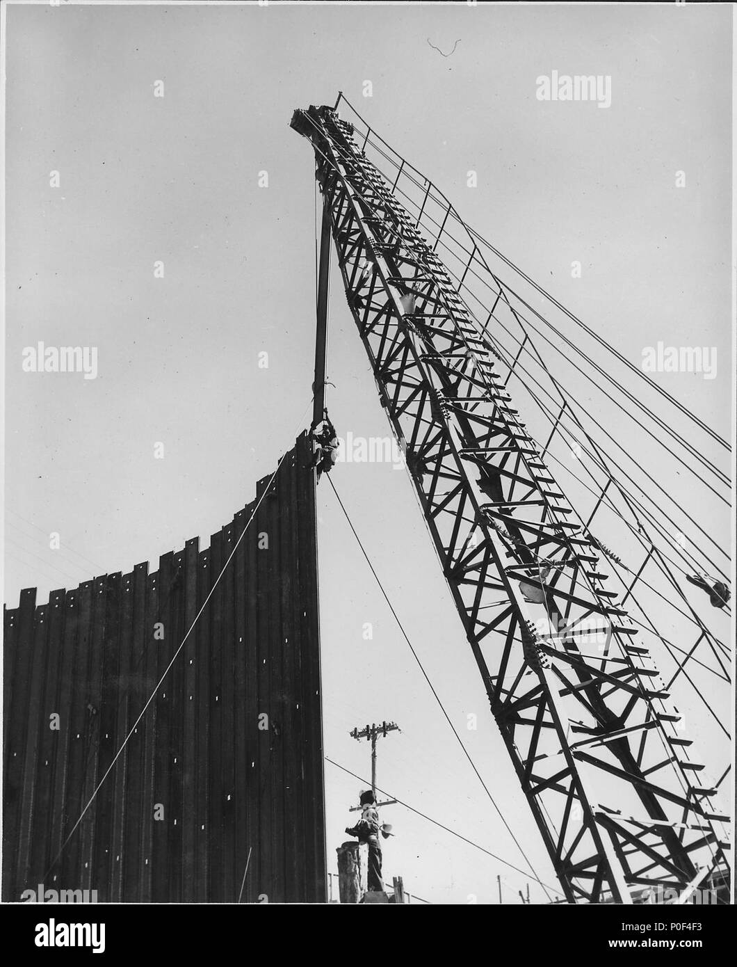 Threading a steel pile in one of the 'block 40' closure cells Stock ...