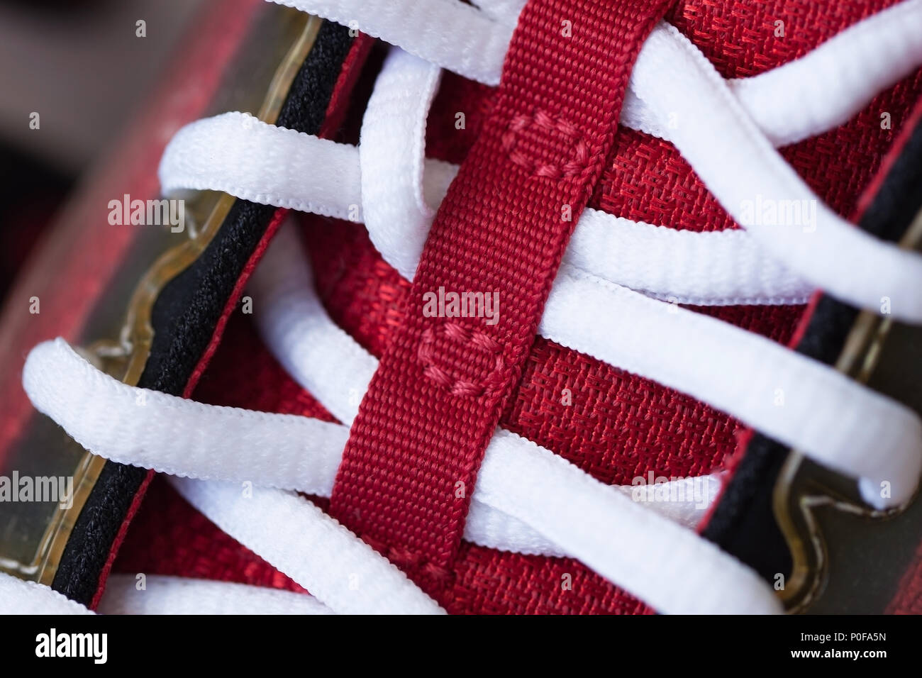 Red sneakers white laces hi-res stock photography and images - Alamy