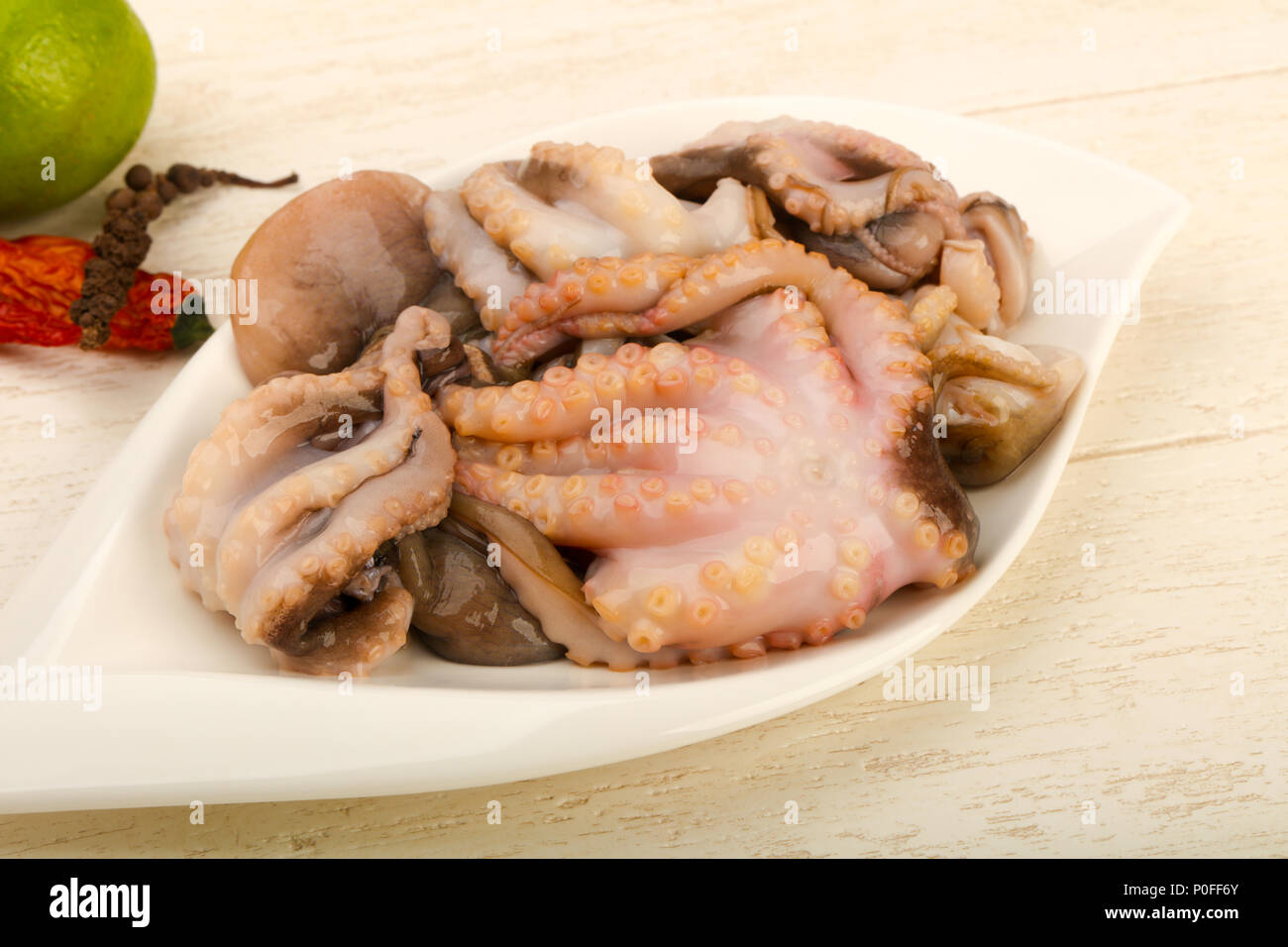 Raw octopus ready for cooking Stock Photo - Alamy