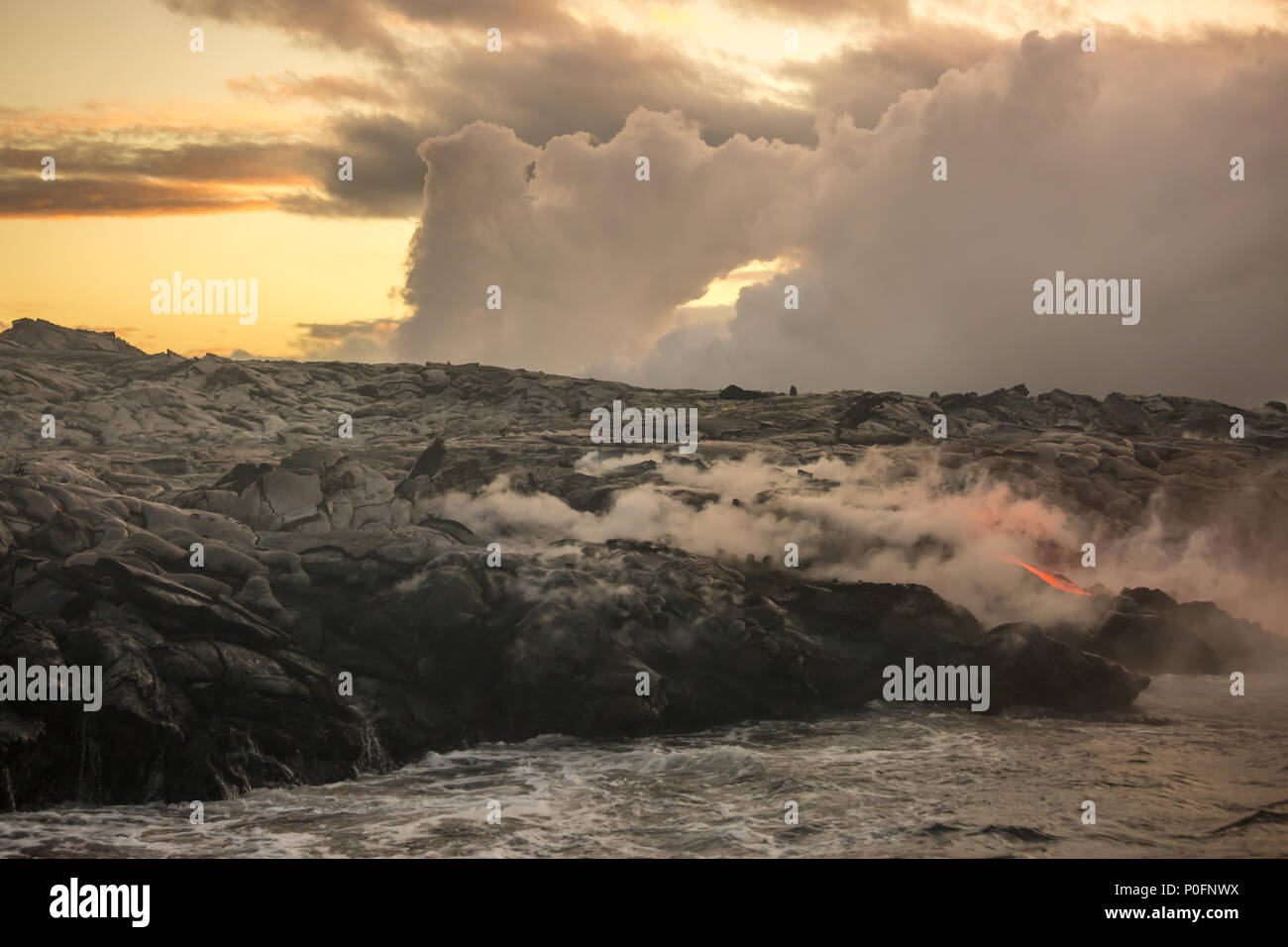 Active lava flow and volcanic eruption during sunrise in Hawaii ...