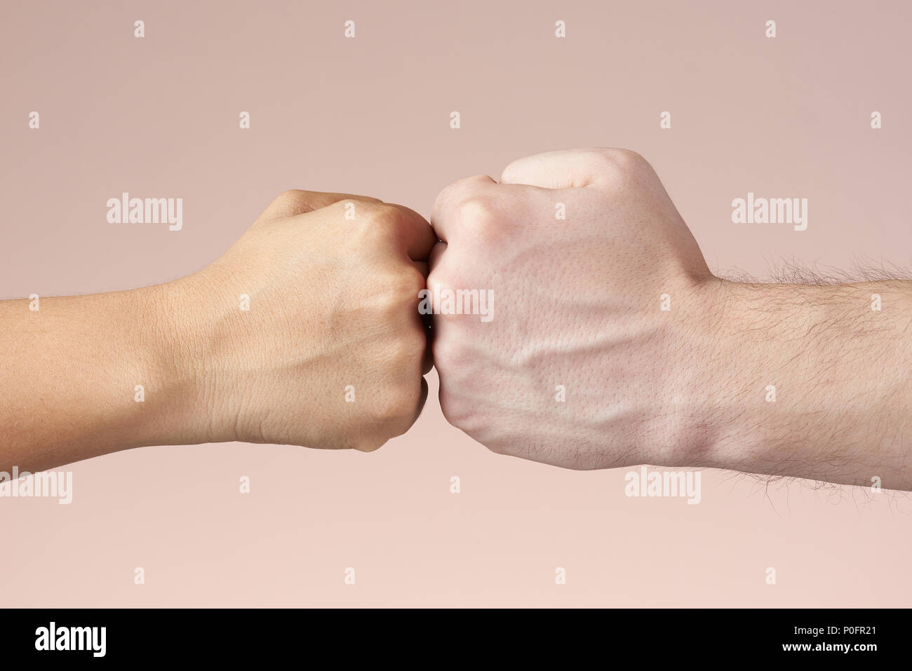 Touching fists together hi-res stock photography and images - Alamy