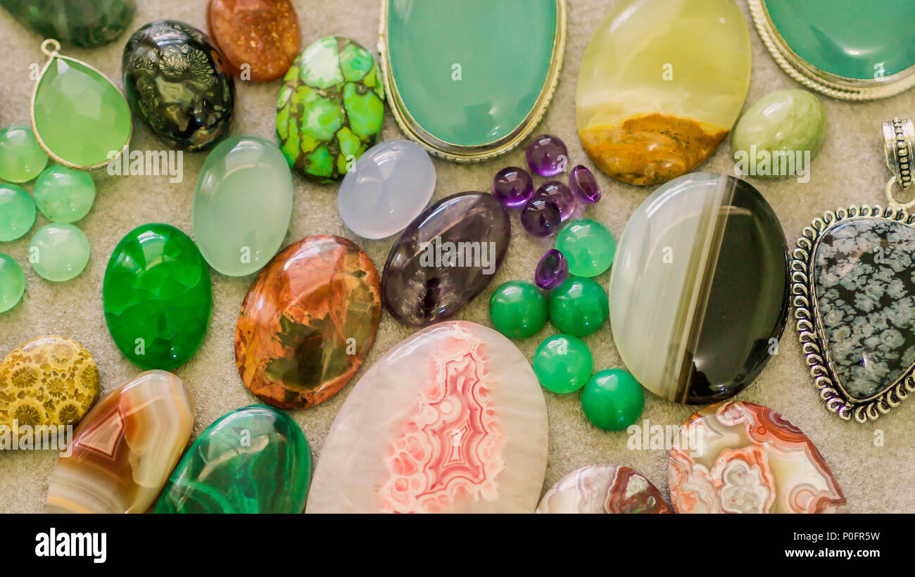 assorted colorful gemstone cabochon. geology and mineral background ...
