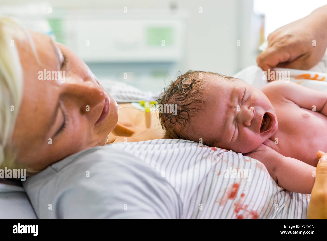 Mother and her newborn boy just after delivery Stock Photo - Alamy