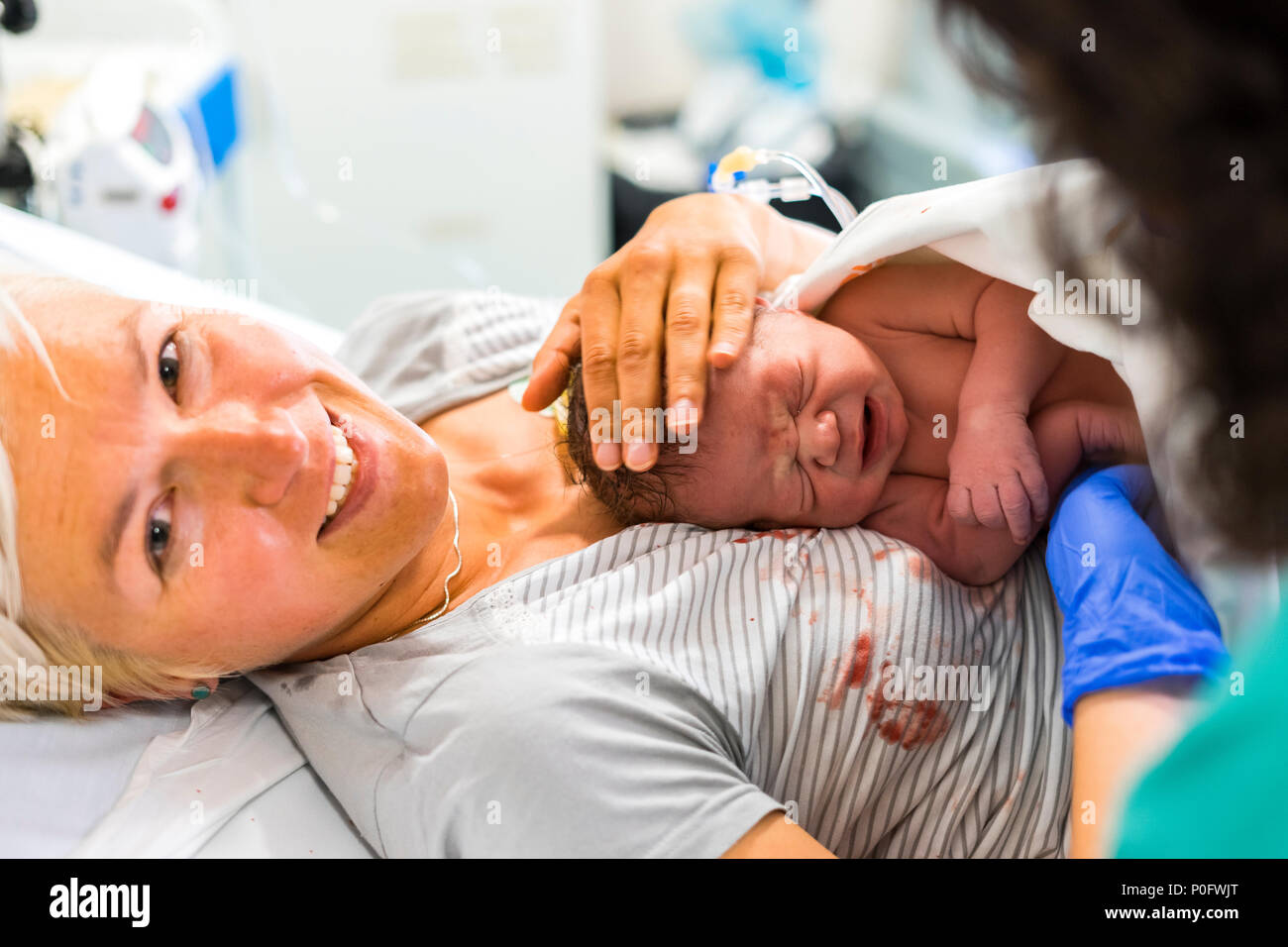 Mother and her newborn boy just after delivery Stock Photo - Alamy