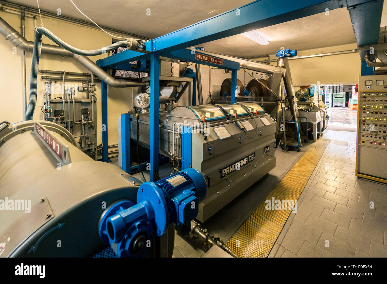 Verona, Italy - November 25, 2016: Machines for processing olive paste ...