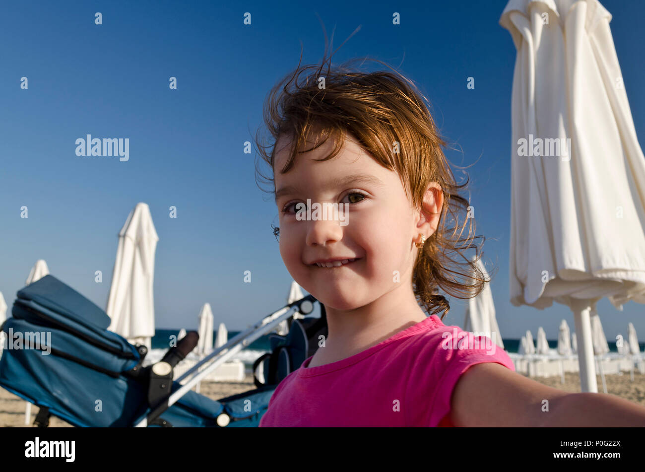 Small angel beauty with sparkling sky in the eyes Stock Photo - Alamy