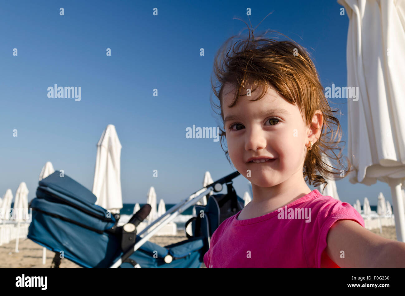 Small angel beauty with sparkling sky in the eyes Stock Photo - Alamy