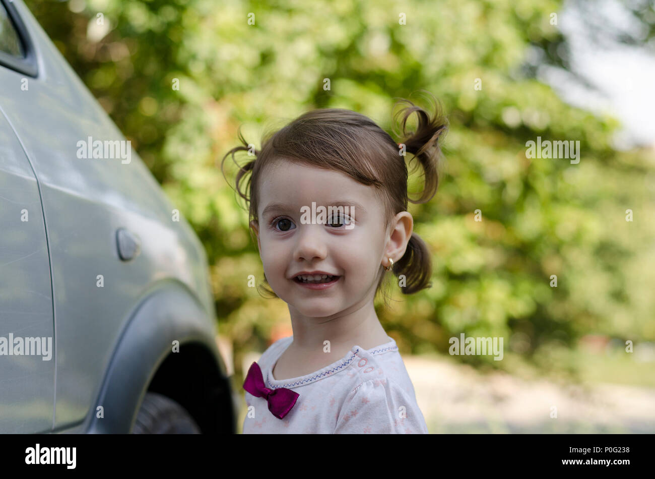 Small angel beauty with sparkling sky in the eyes Stock Photo - Alamy