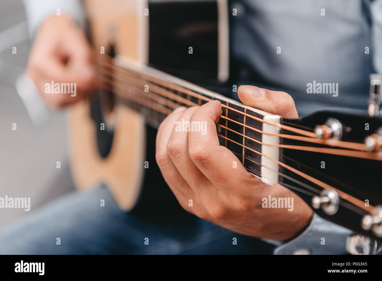 Cropped shot man playing instrument hi-res stock photography and images ...