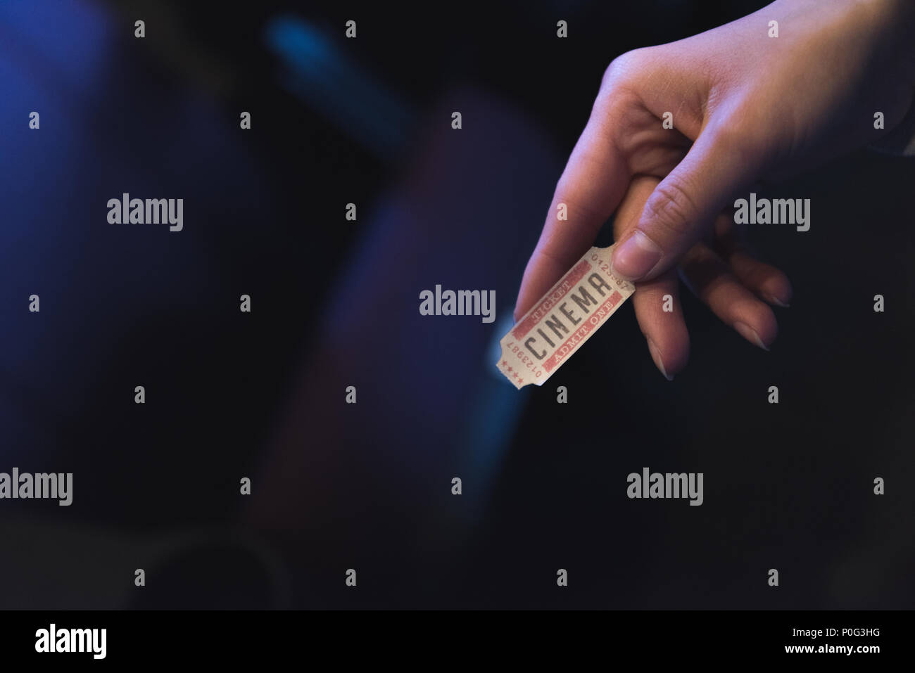 Person holding movie ticket hi-res stock photography and images - Alamy