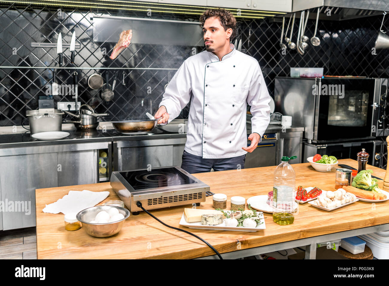Chef tossing hi-res stock photography and images - Alamy