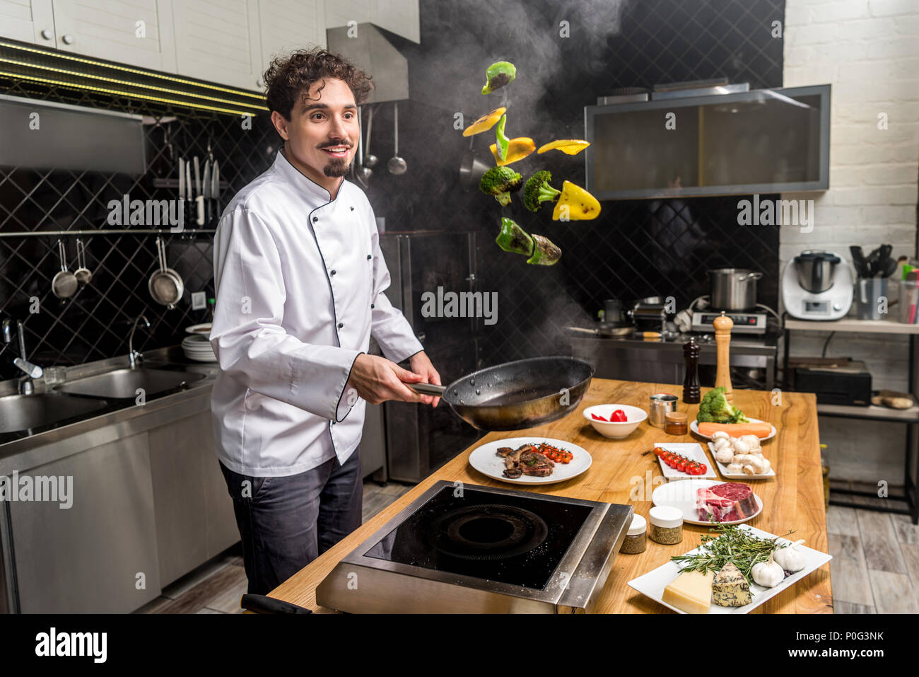 Tossing meat hi-res stock photography and images - Alamy