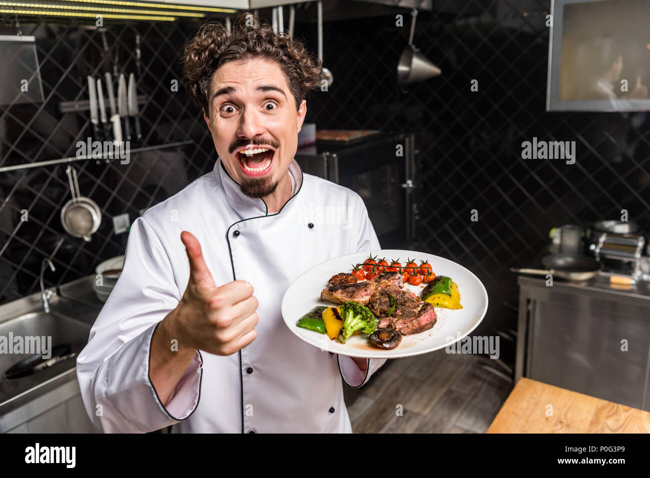 Professional chef showing thumb hi-res stock photography and images - Alamy