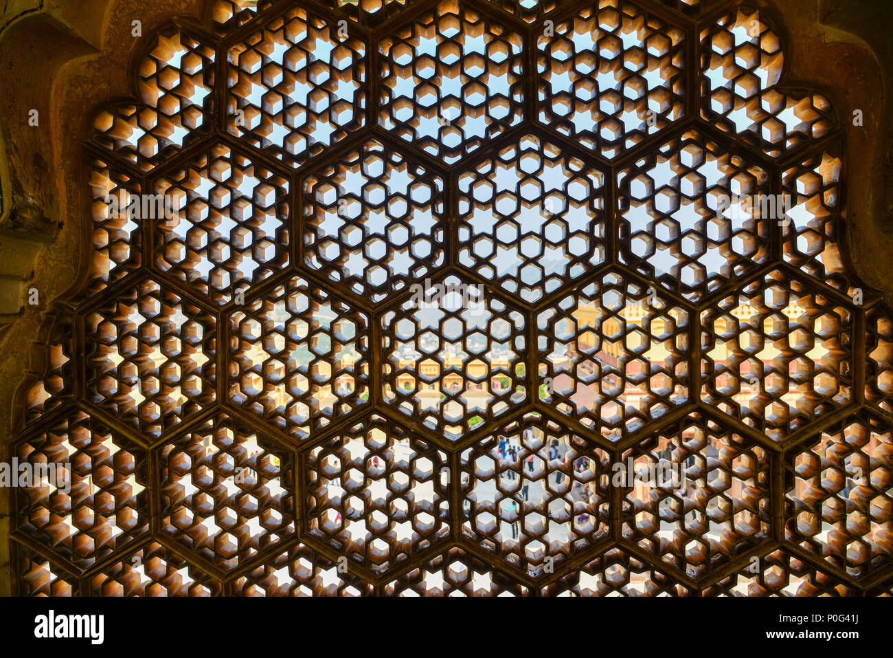 Decorations of sandstone window at ancient fort in Agra, India Stock ...
