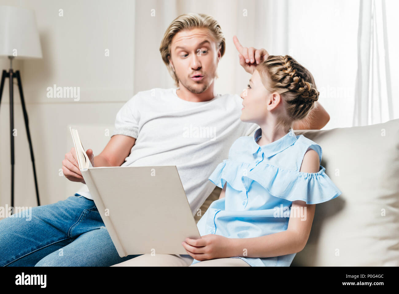 Father pointing up hi-res stock photography and images - Alamy
