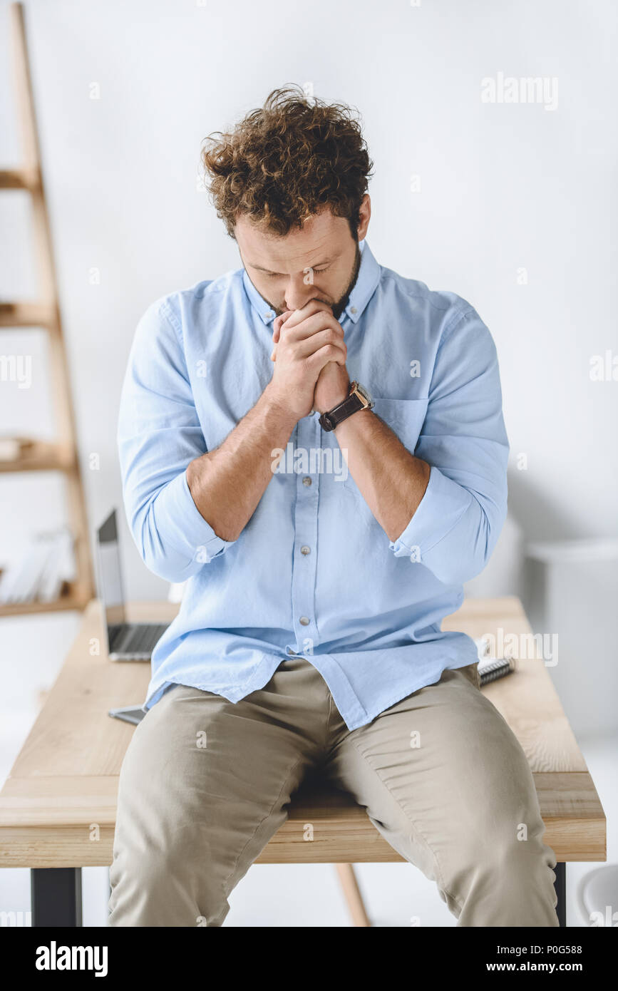 Businessman praying hi-res stock photography and images - Alamy