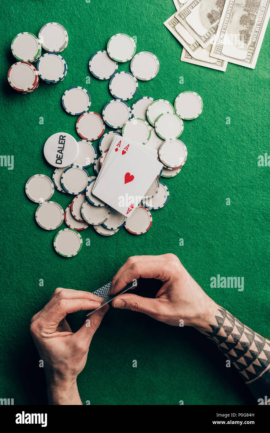 Man holding poker cards hi-res stock photography and images - Alamy