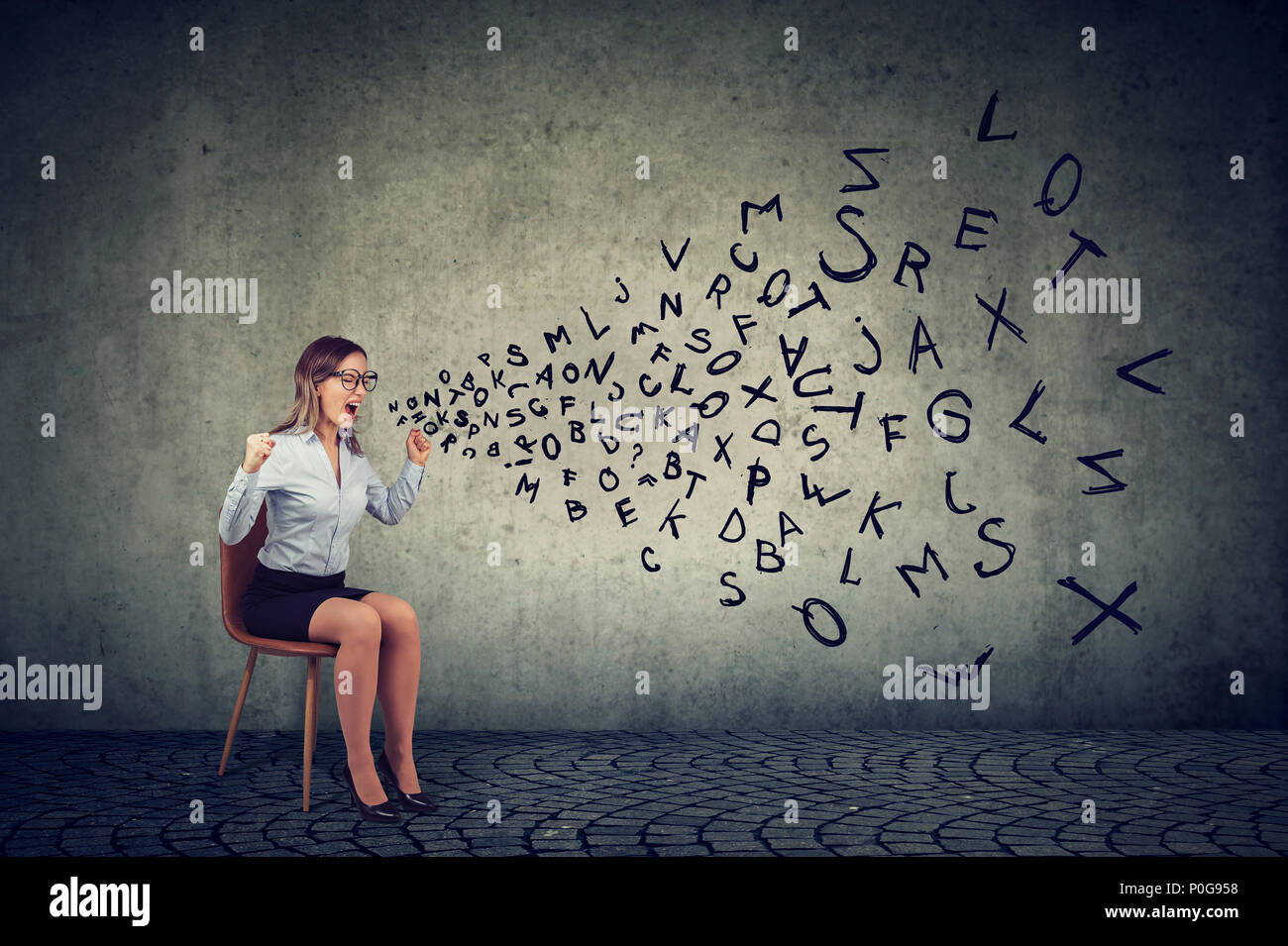 Woman sitting chair angry hi-res stock photography and images - Alamy