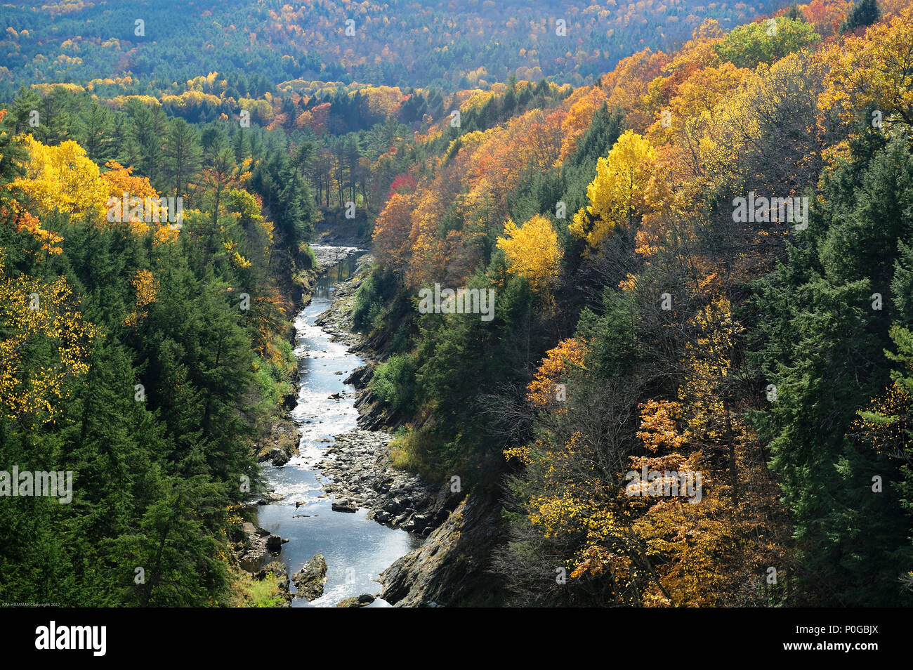 Fall colors brighten the Ottauquechee River and Quechee Gorge in ...