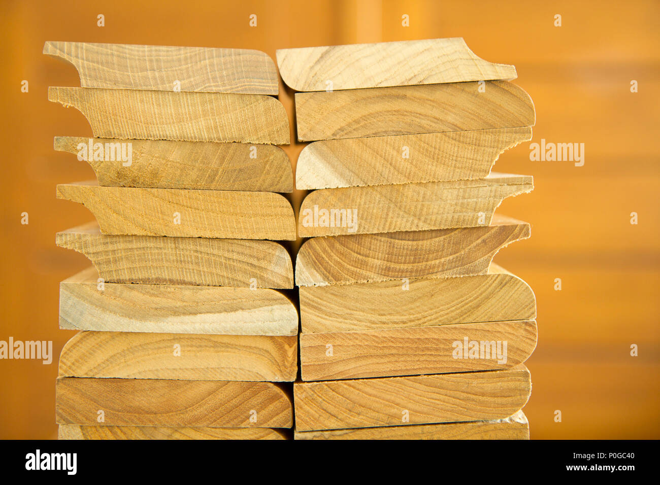 Stack of cutted solid teak wood with wooden background Stock Photo - Alamy