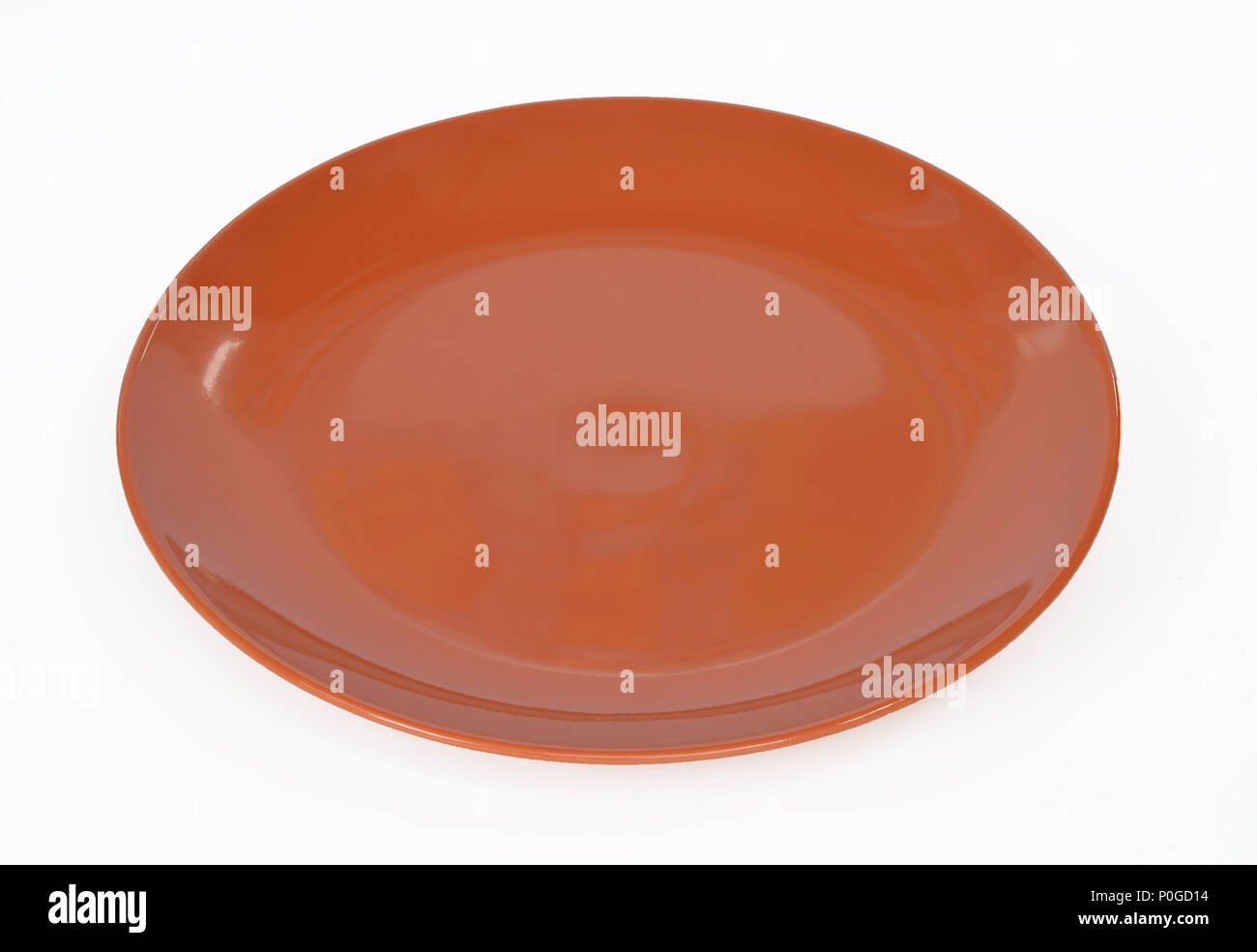 Brown plate isolated on white background. Clipping Path Stock Photo - Alamy