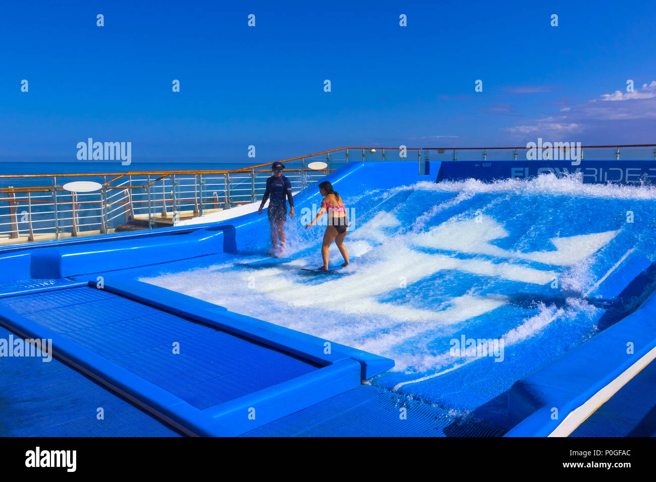 Falmouth Jamaica May 02 2018 Woman Surfing On The Flowrider Aboard The Oasis Of The Seas By