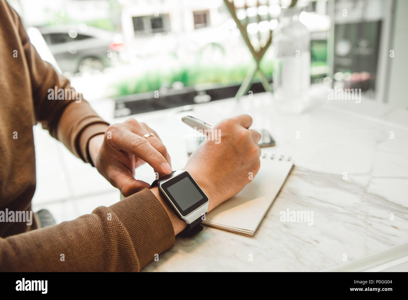 Man wears watch hi-res stock photography and images - Alamy