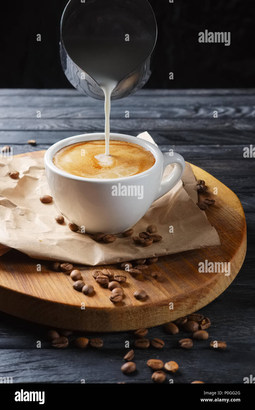 Cream pouring coffee hi-res stock photography and images - Alamy