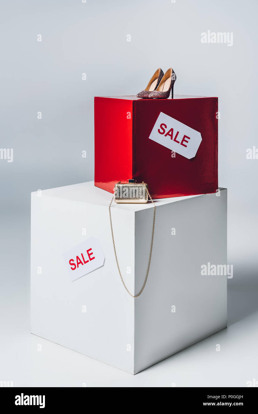 handbag, high heels and sale signs, summer sale concept Stock Photo - Alamy